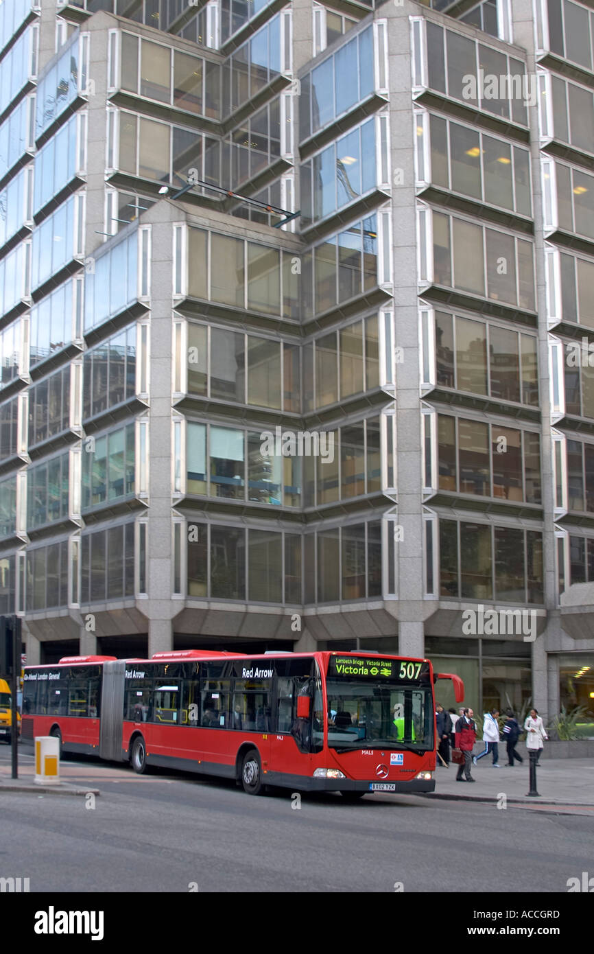 Victoria Street with red bendy bus London SW1 England Stock Photo - Alamy