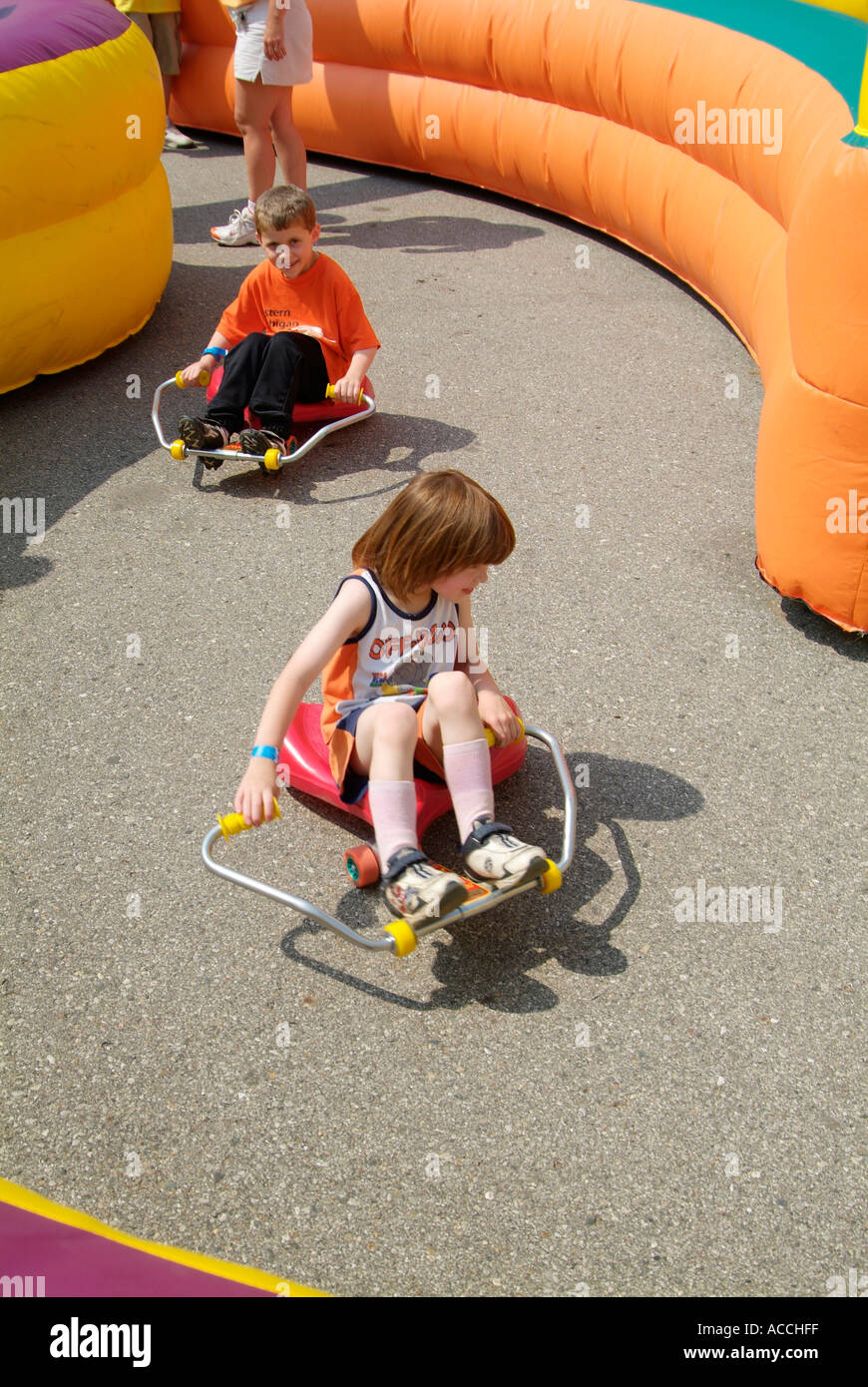 Children ride on safe roller vehicle platform Stock Photo - Alamy