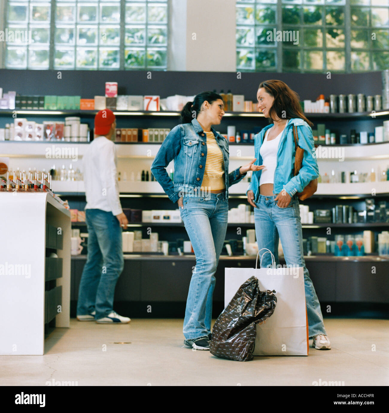Two women in a make-up store Stock Photo - Alamy
