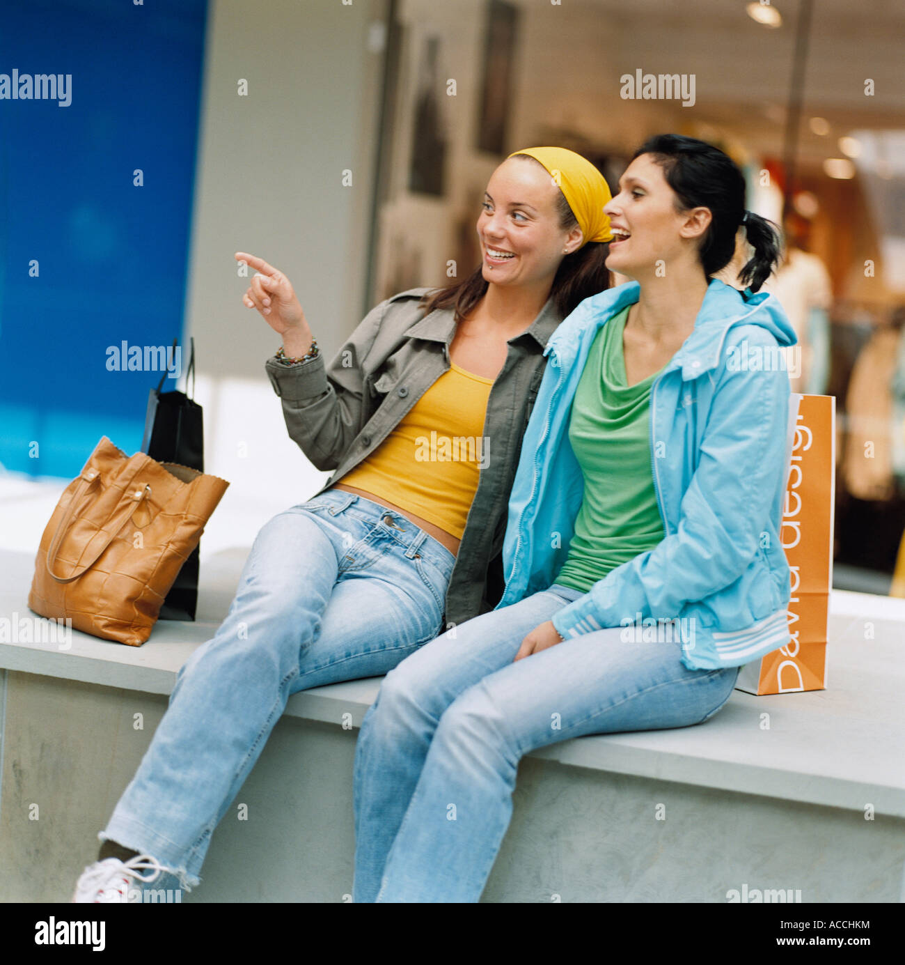Two women laughing Stock Photo - Alamy