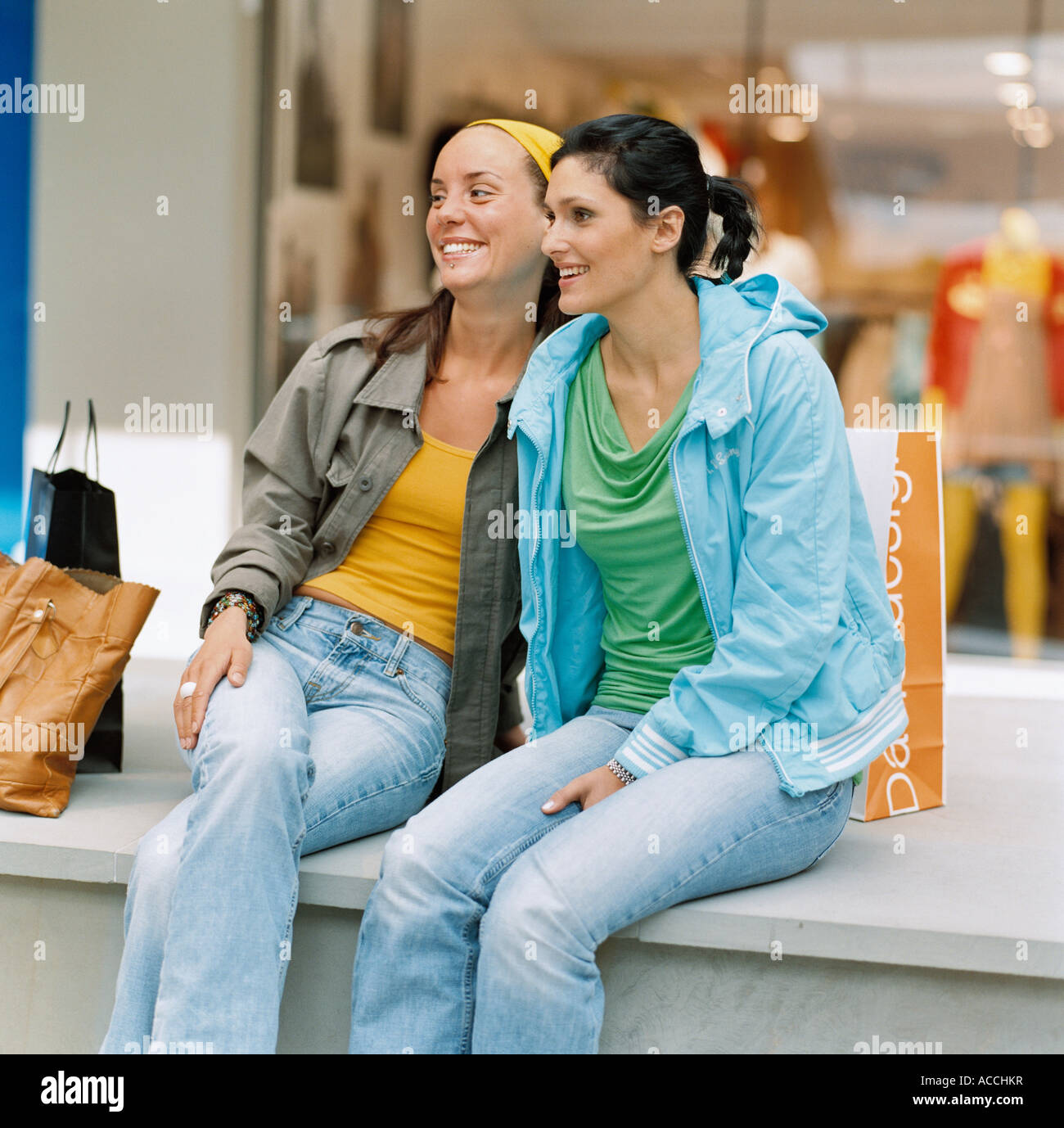 Two women laughing Stock Photo - Alamy