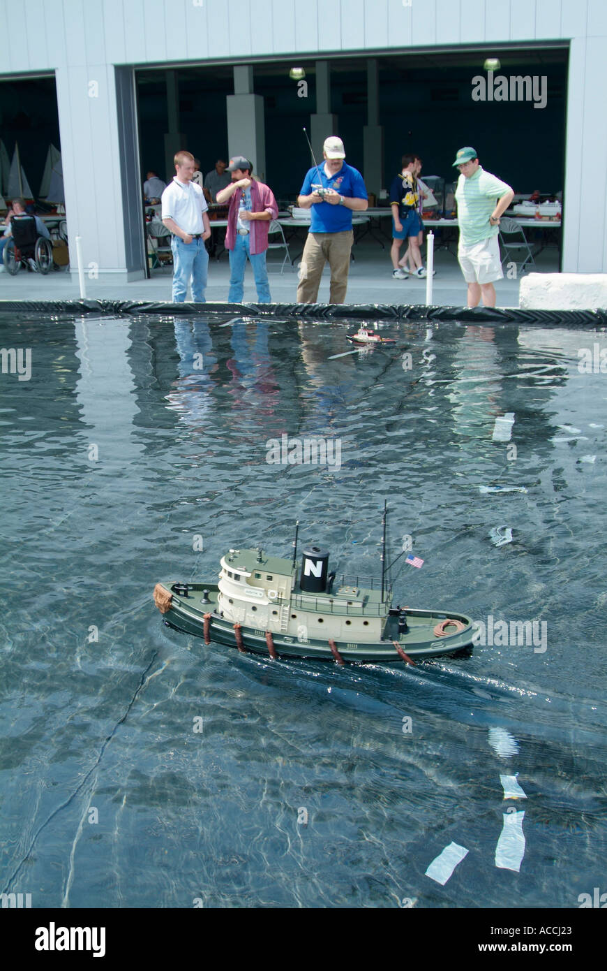 Model boat hobbyist club demonstrate ships and boats at local ...