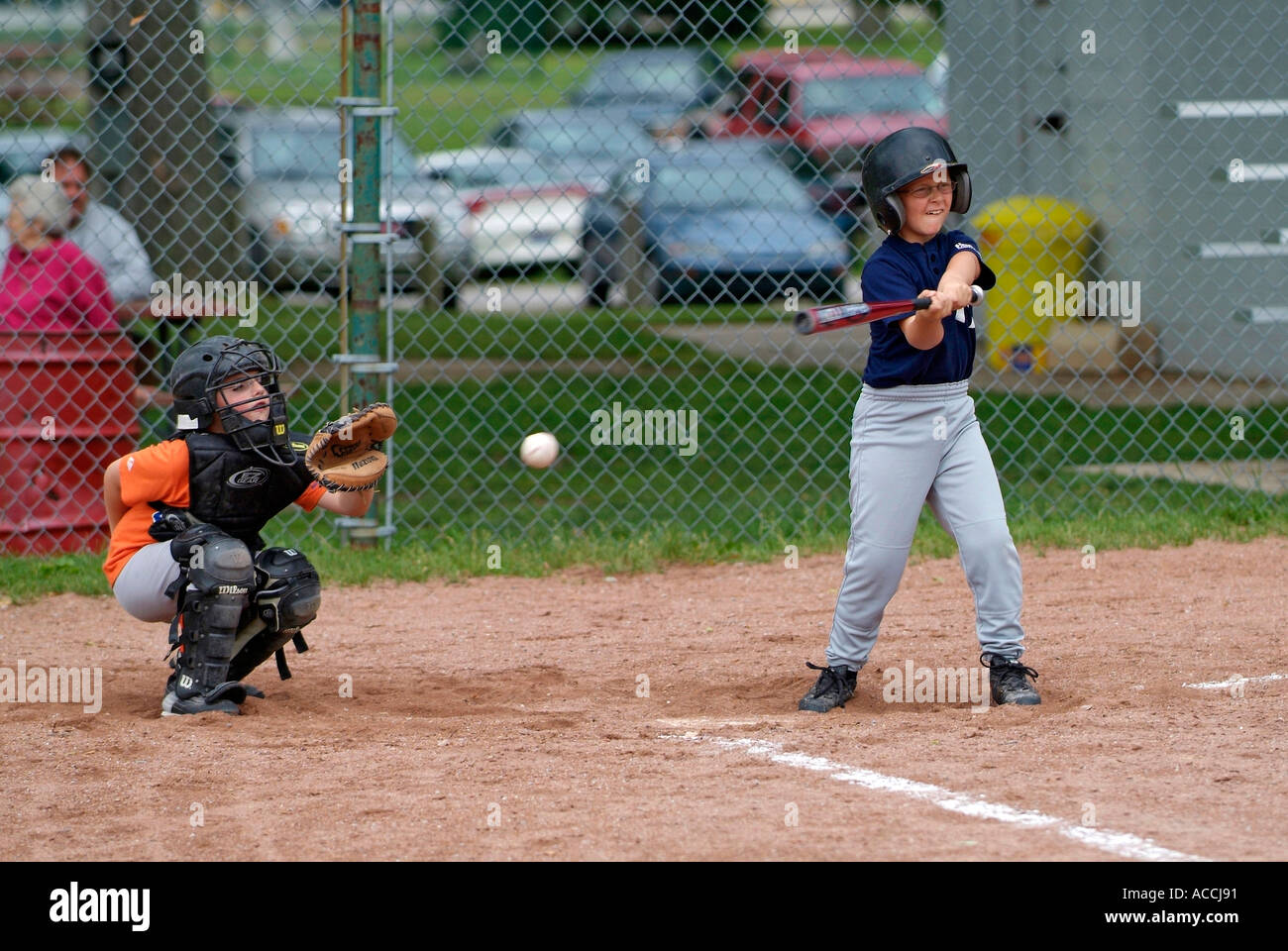 Baseball Softball little league action Stock Photo - Alamy