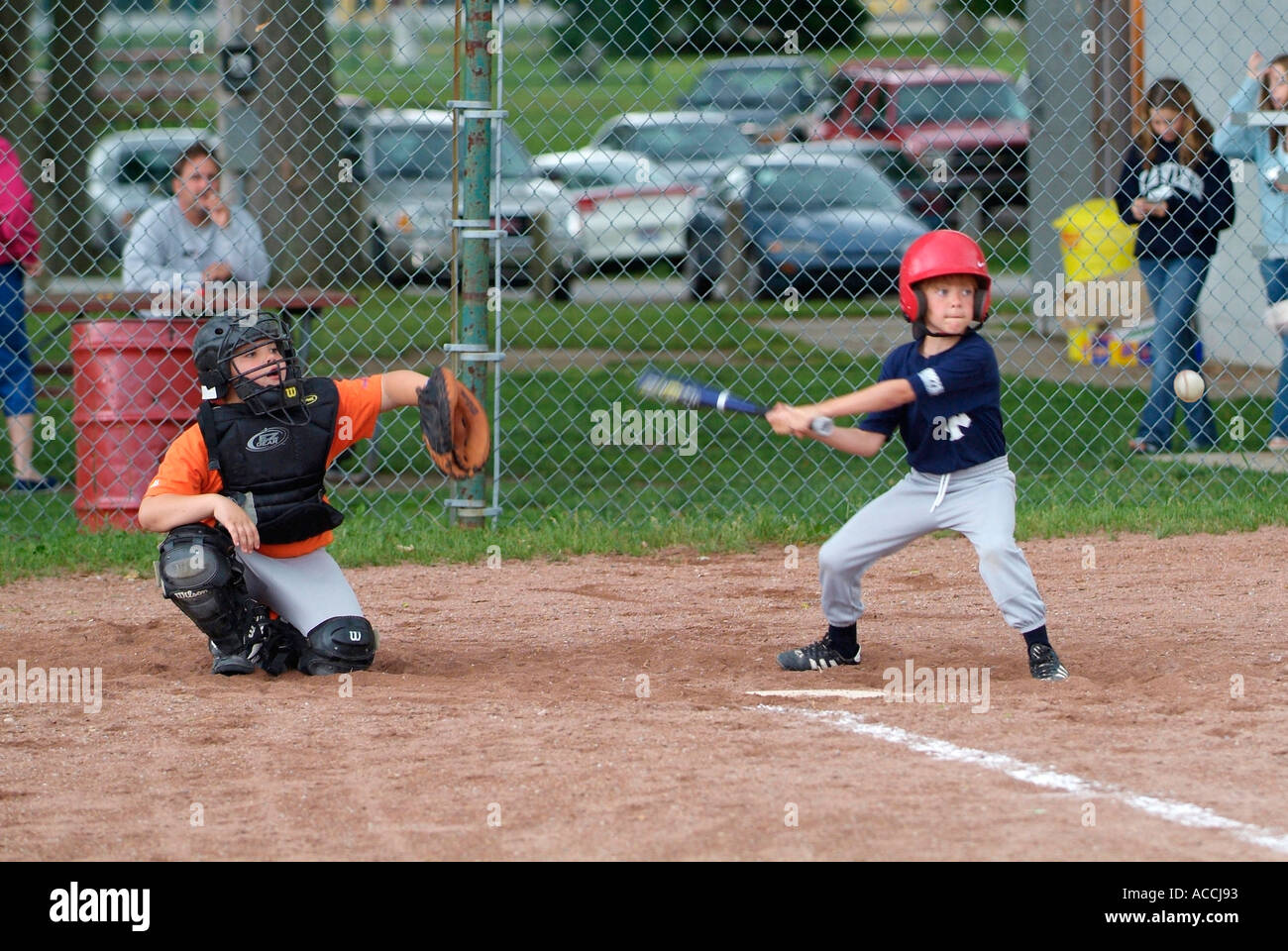 Baseball Softball little league action Stock Photo - Alamy