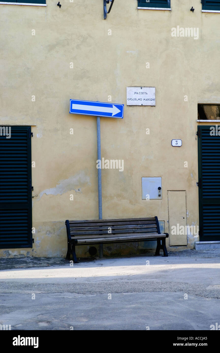 Bench with street sign Stock Photo - Alamy