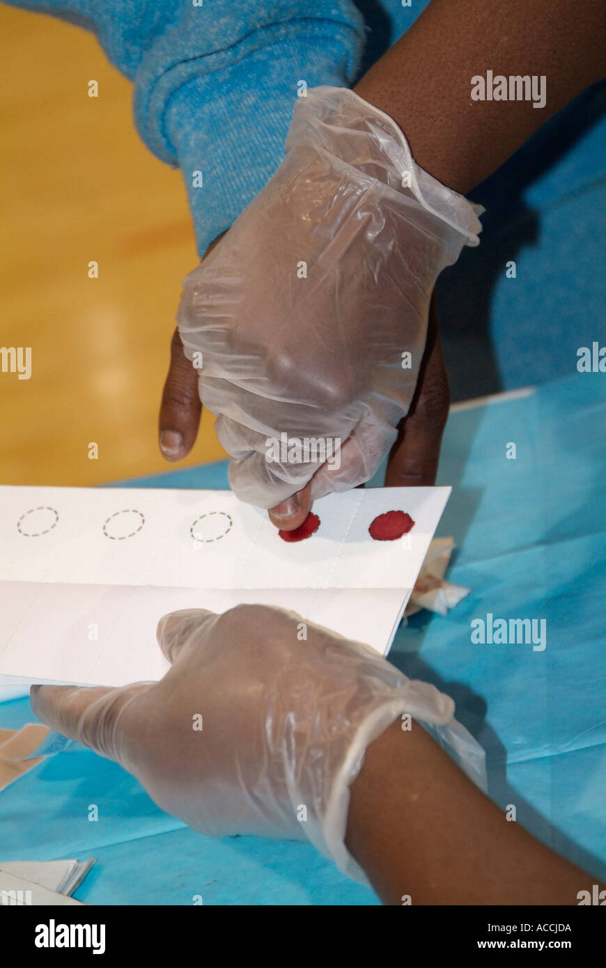 Citizens are tested before donating blood to the American Red Cross ...