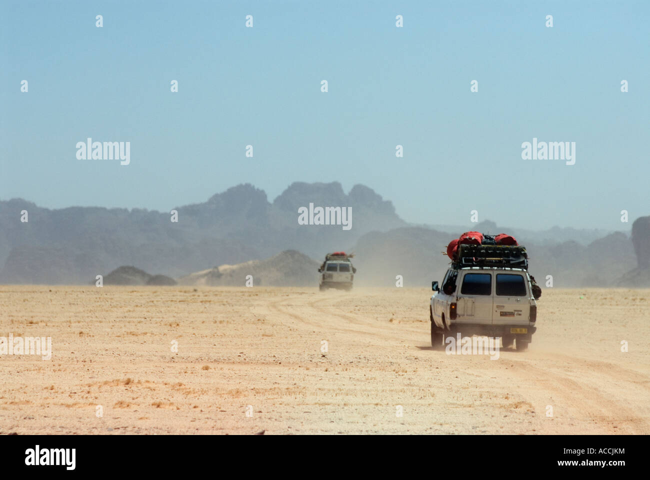 A Tuareg Landcruiser crosses the awesome Tassili N'Ajjer landscape in ...