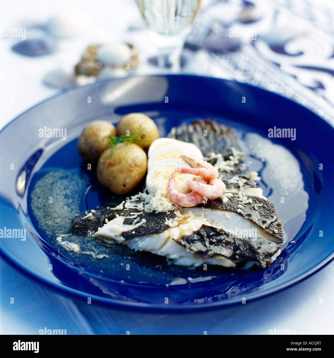A fish course with pike shrimps and potatoes close-up Stock Photo - Alamy