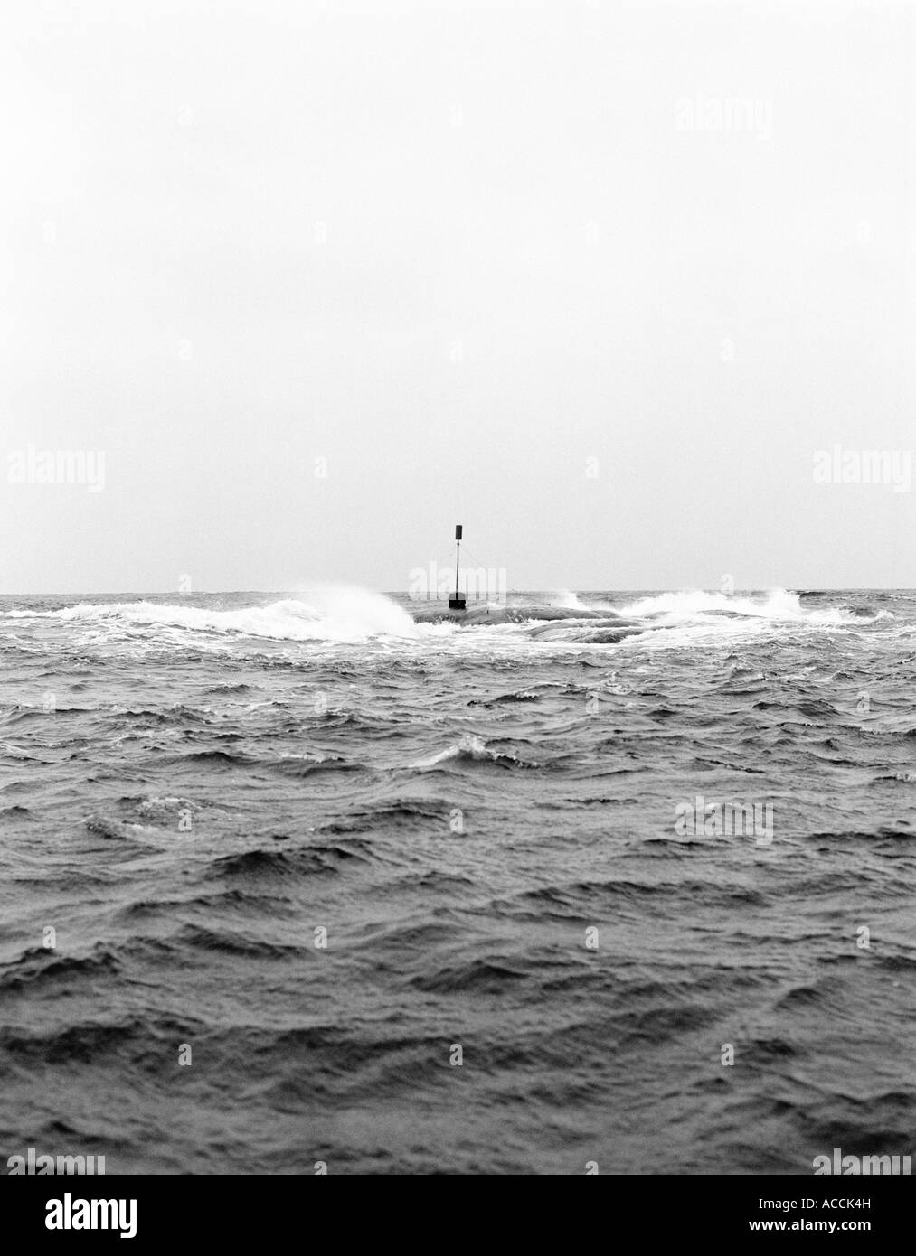 Open sea and a navigation mark Stock Photo - Alamy