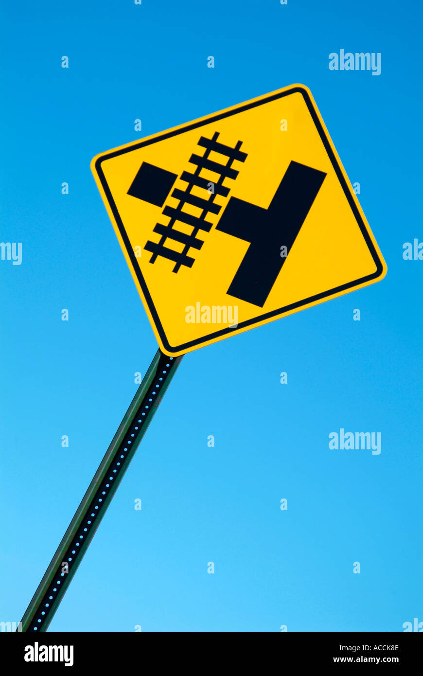 Traffic sign warning motorist of a railroad train track on a connecting ...