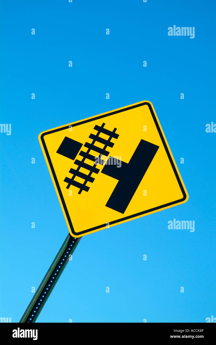 Traffic sign warning motorist of a railroad train track on a connecting ...