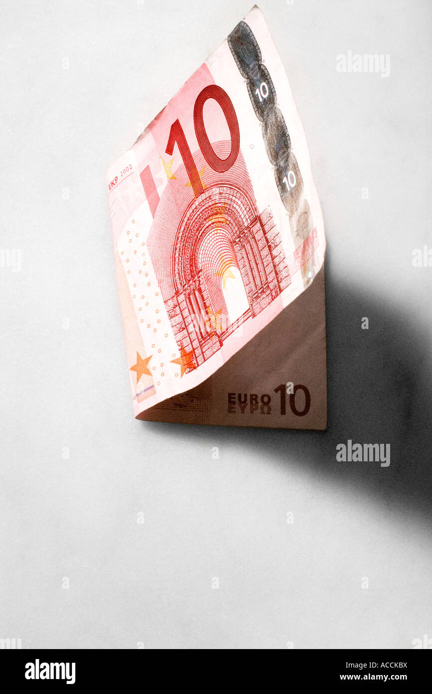 A folded Euro bill close-up Stock Photo - Alamy