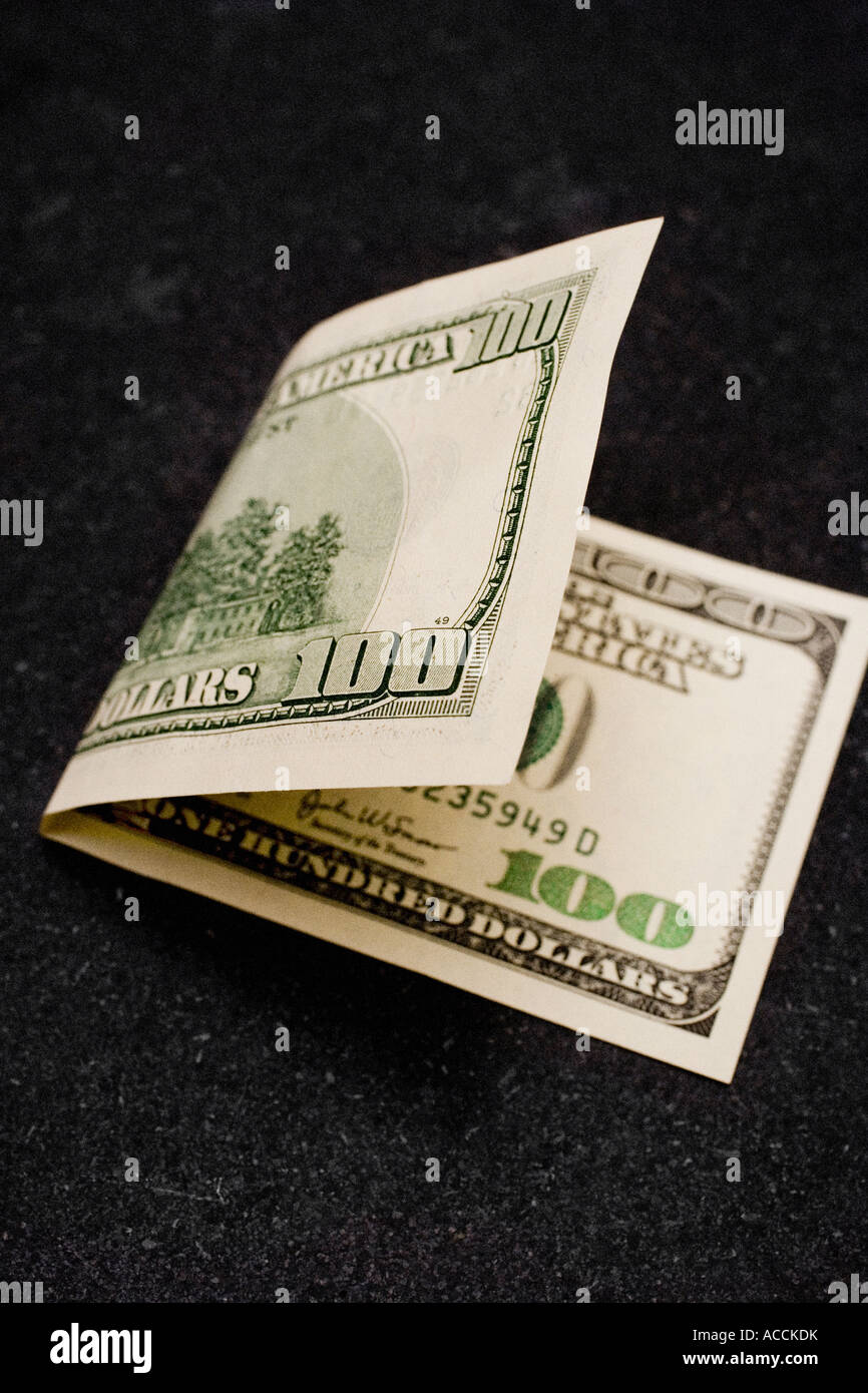 A folded dollar bill close-up Stock Photo - Alamy
