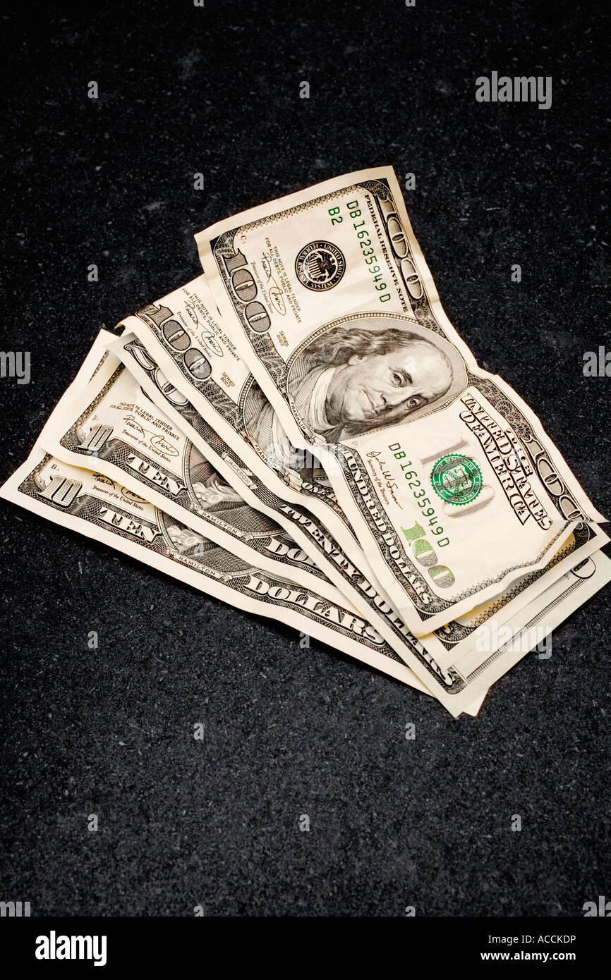 A pile of dollar bills Stock Photo - Alamy