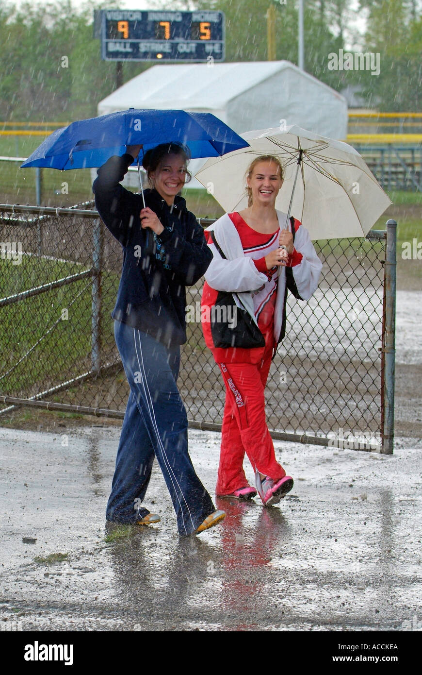 People avoid getting wet by using umbrella during rain storm Stock ...