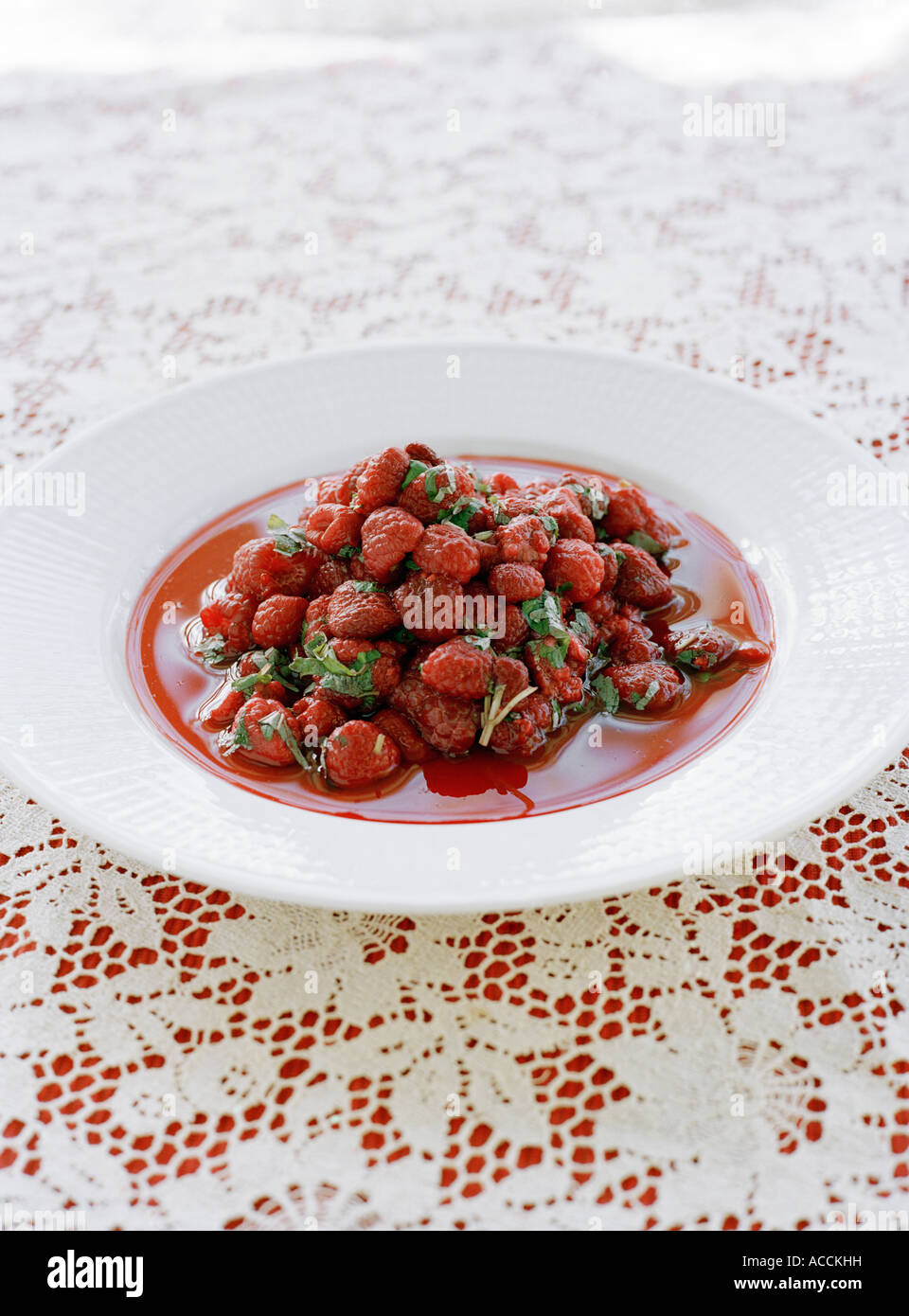 Raspberries in Swedish punch Stock Photo - Alamy