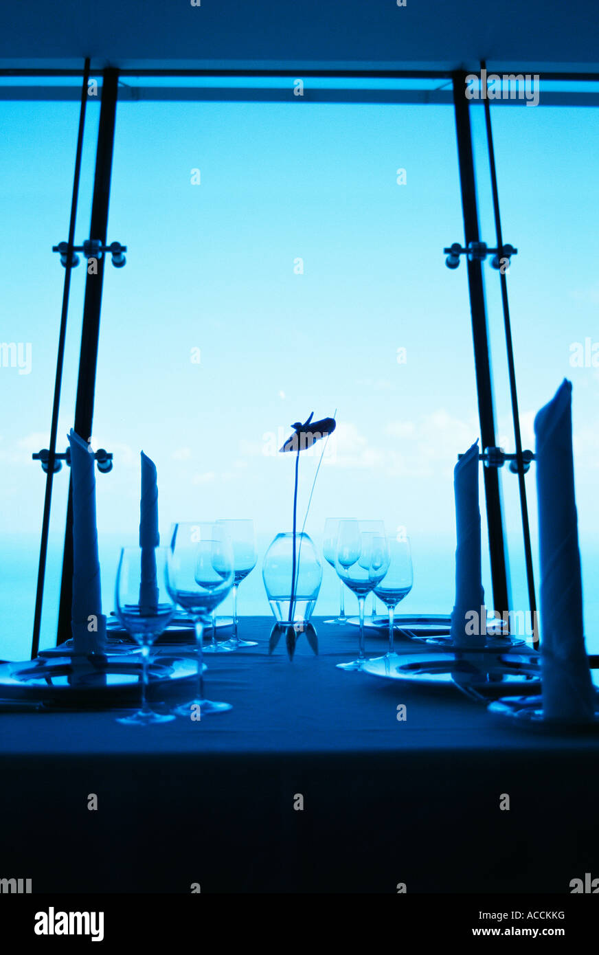 Table by the window Stock Photo - Alamy