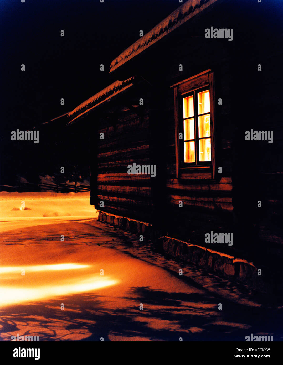 A log house at night Stock Photo - Alamy