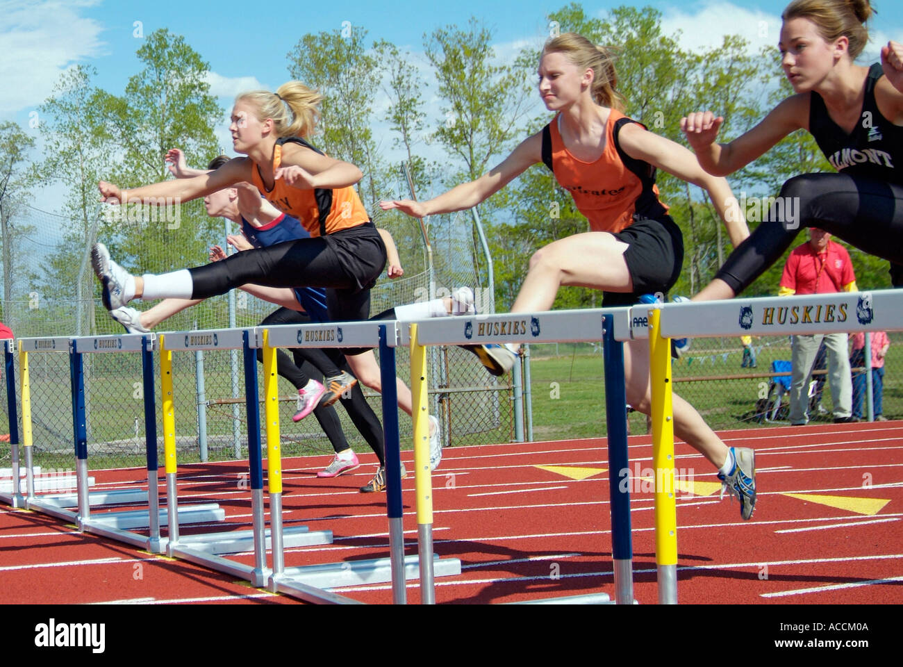 High School Track And Field Events Jumping The Hurdles Stock Photo Alamy high-school-track-and-field-events-jumping-the-hurdles-stock-photo-alamy