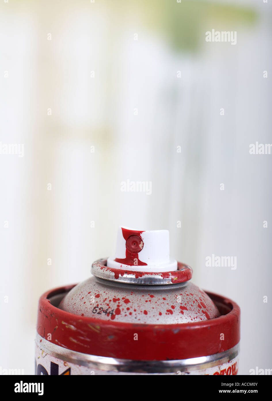 A spray bottle with red paint close-up Stock Photo - Alamy