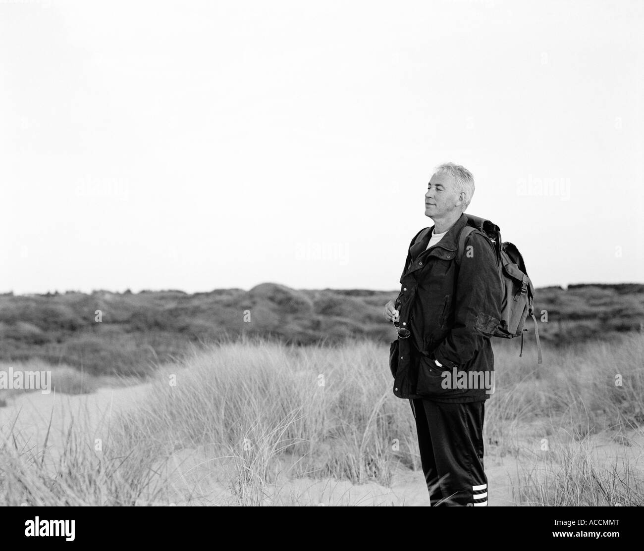 Mature man full length casual Black and White Stock Photos & Images - Alamy