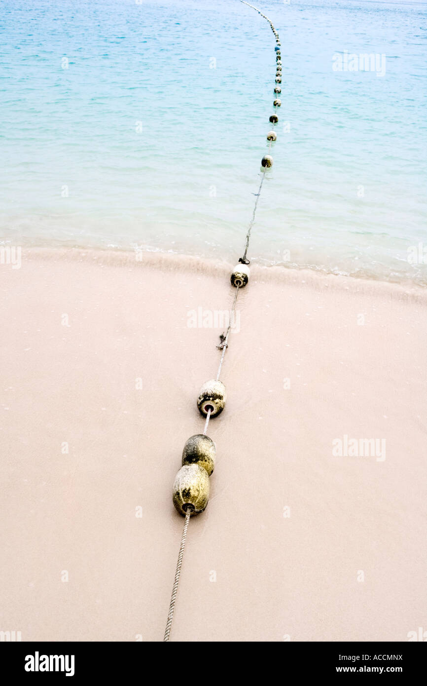 Buoys on a rope on a beach Stock Photo - Alamy