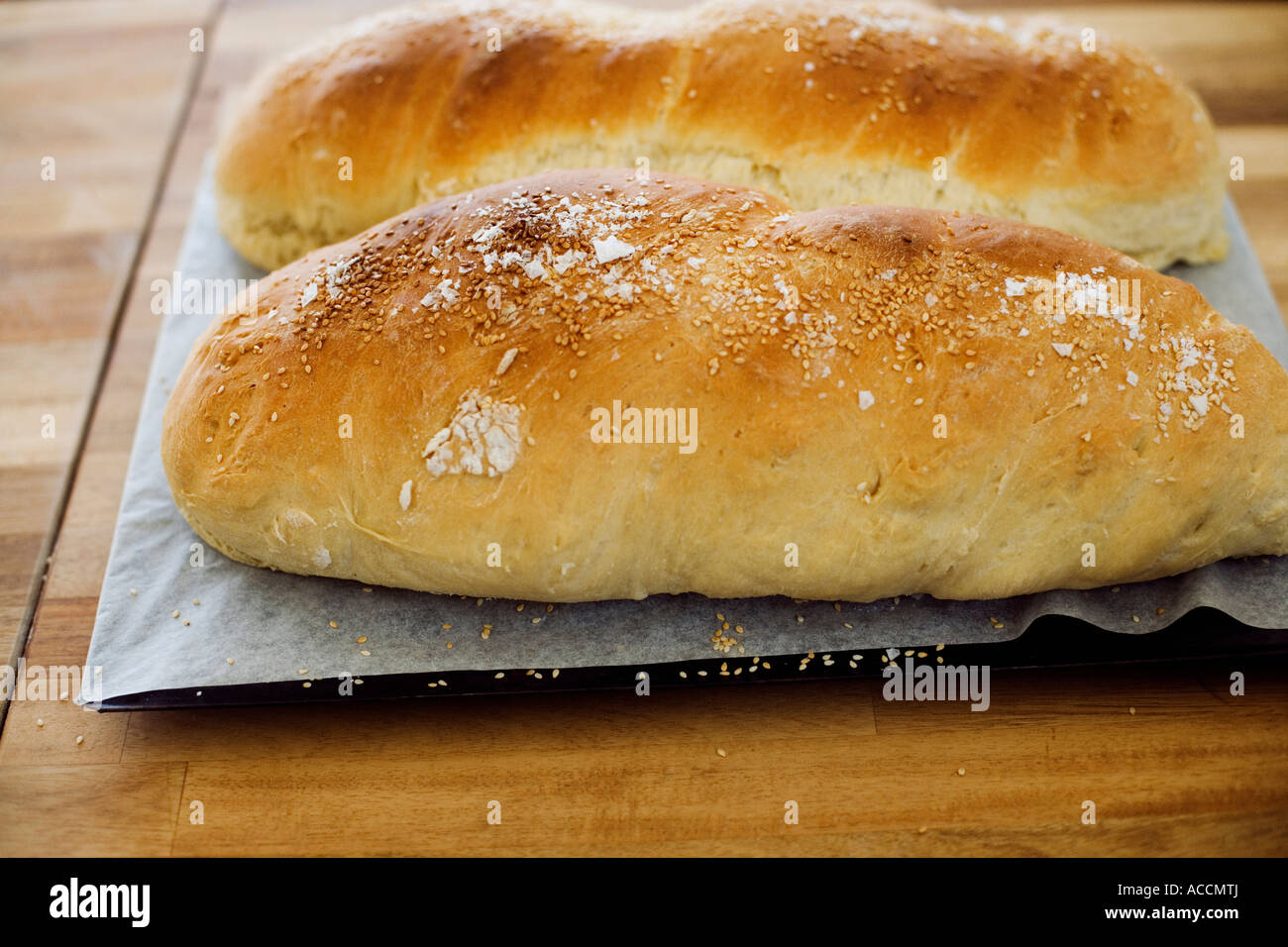 Two newly baked loafs of bread Stock Photo - Alamy