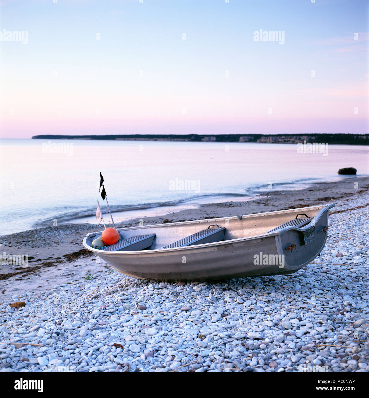 A rowing-boat on a beach Stock Photo - Alamy