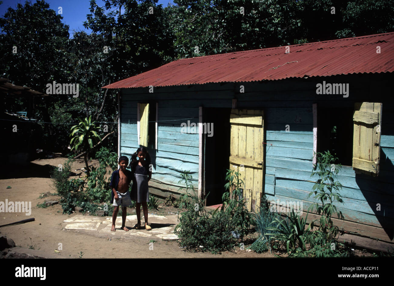 Dominican children outside a bahia house in the Dominican Alps ...