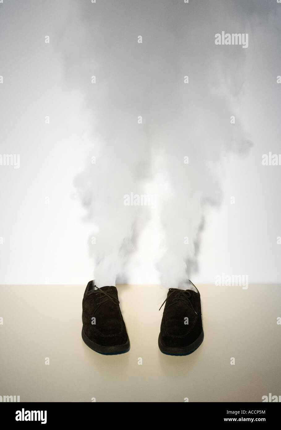 Pair of shoes smoking hi-res stock photography and images - Alamy