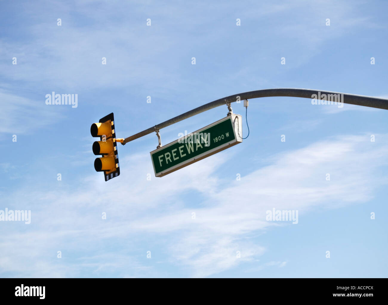 A road sign and traffic lights Stock Photo - Alamy