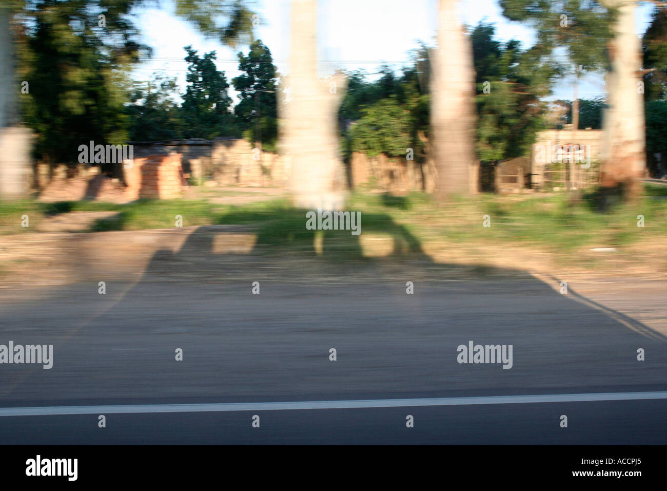 4x4 shadow on road, Argentina Stock Photo - Alamy