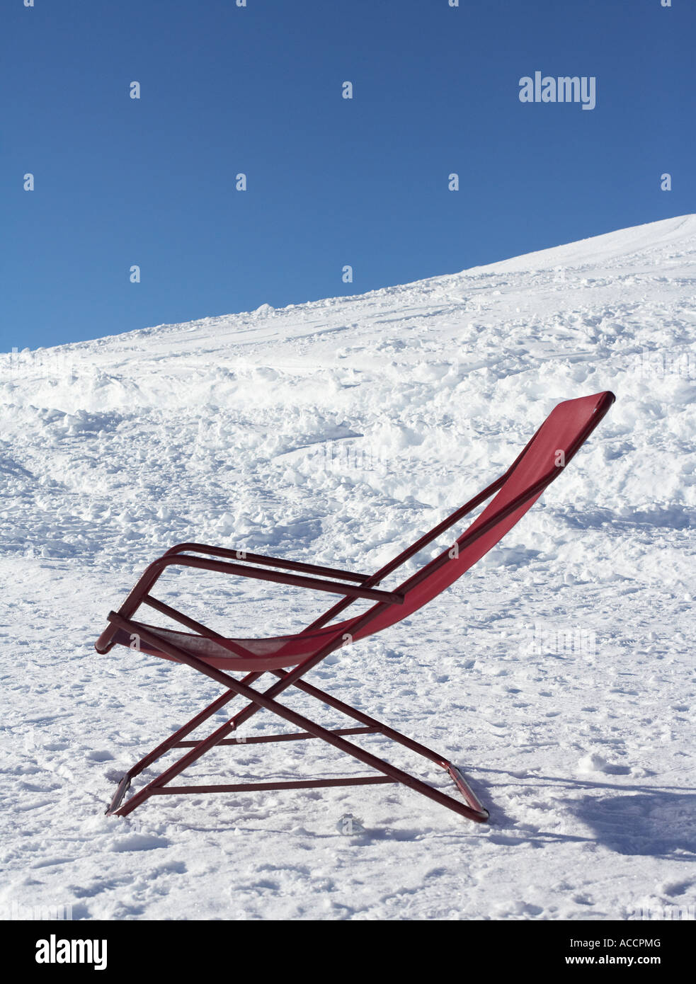 A sun chair in snow Stock Photo - Alamy
