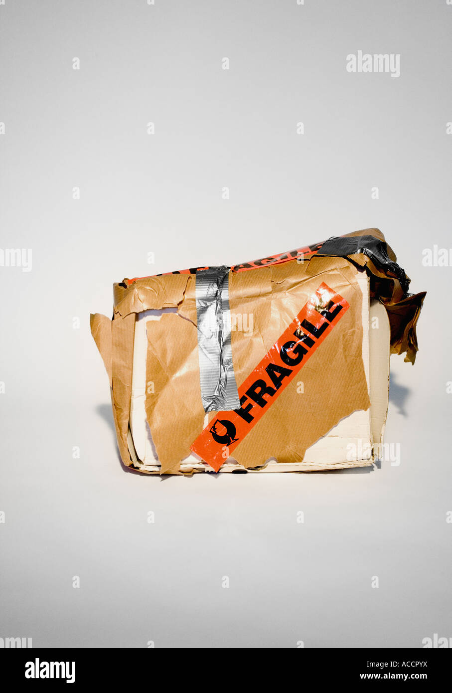 A broken parcel Stock Photo - Alamy