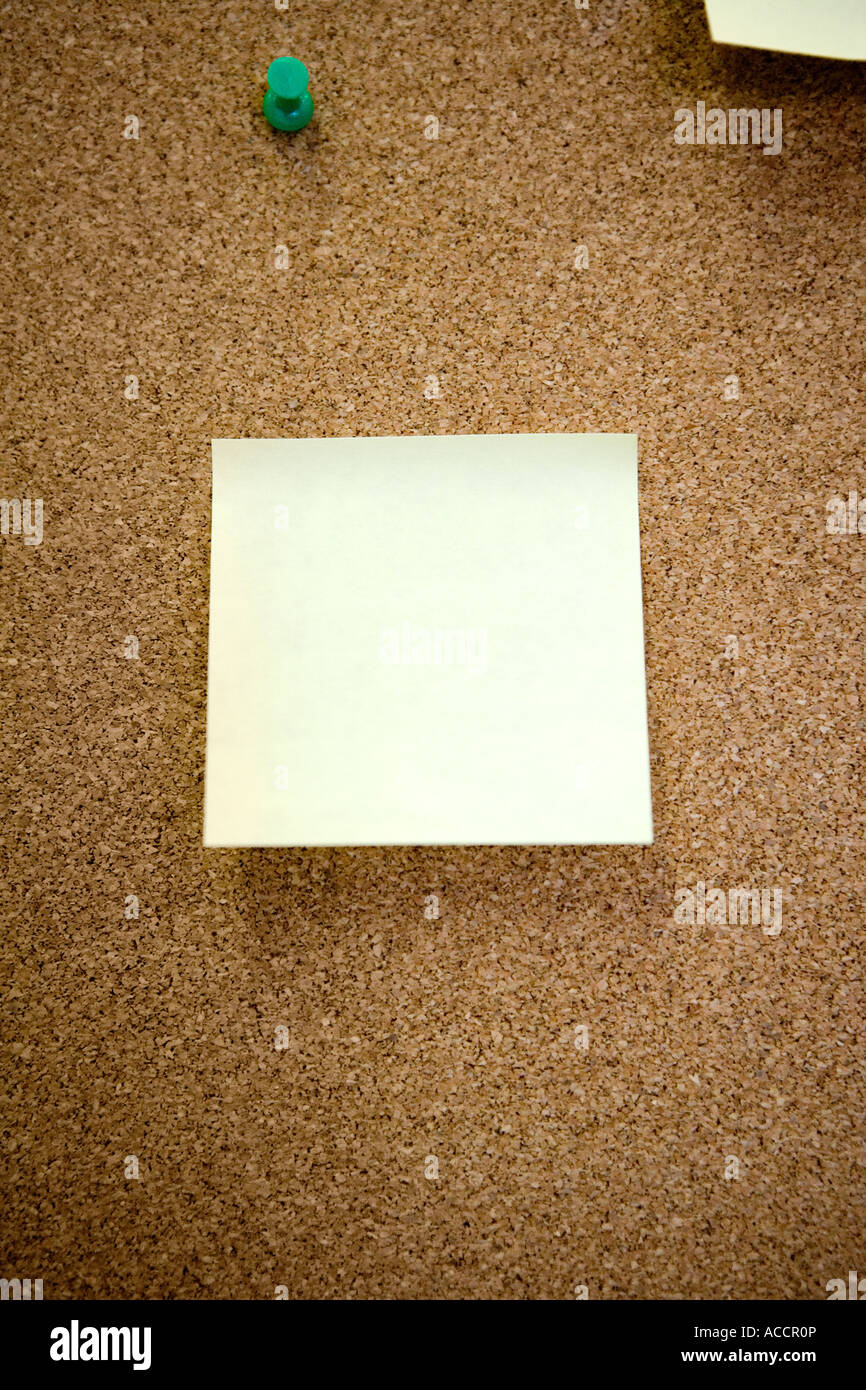 A post-it note on a notice board Stock Photo - Alamy