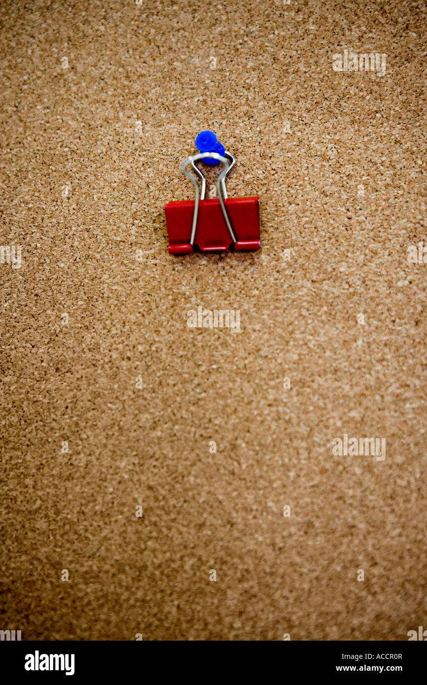 A paper clip on a notice board Stock Photo - Alamy