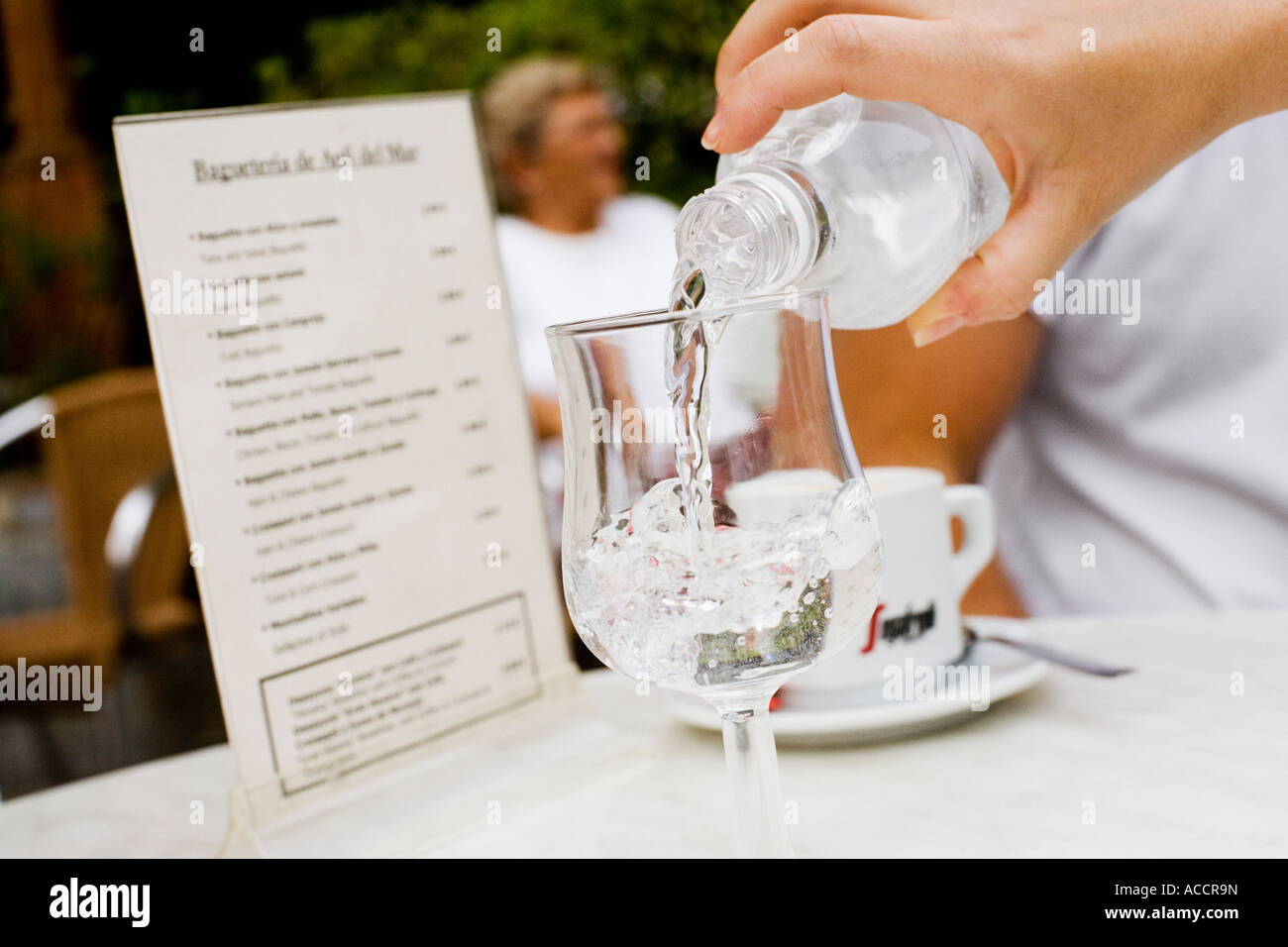 Water being poured in a glass Stock Photo - Alamy
