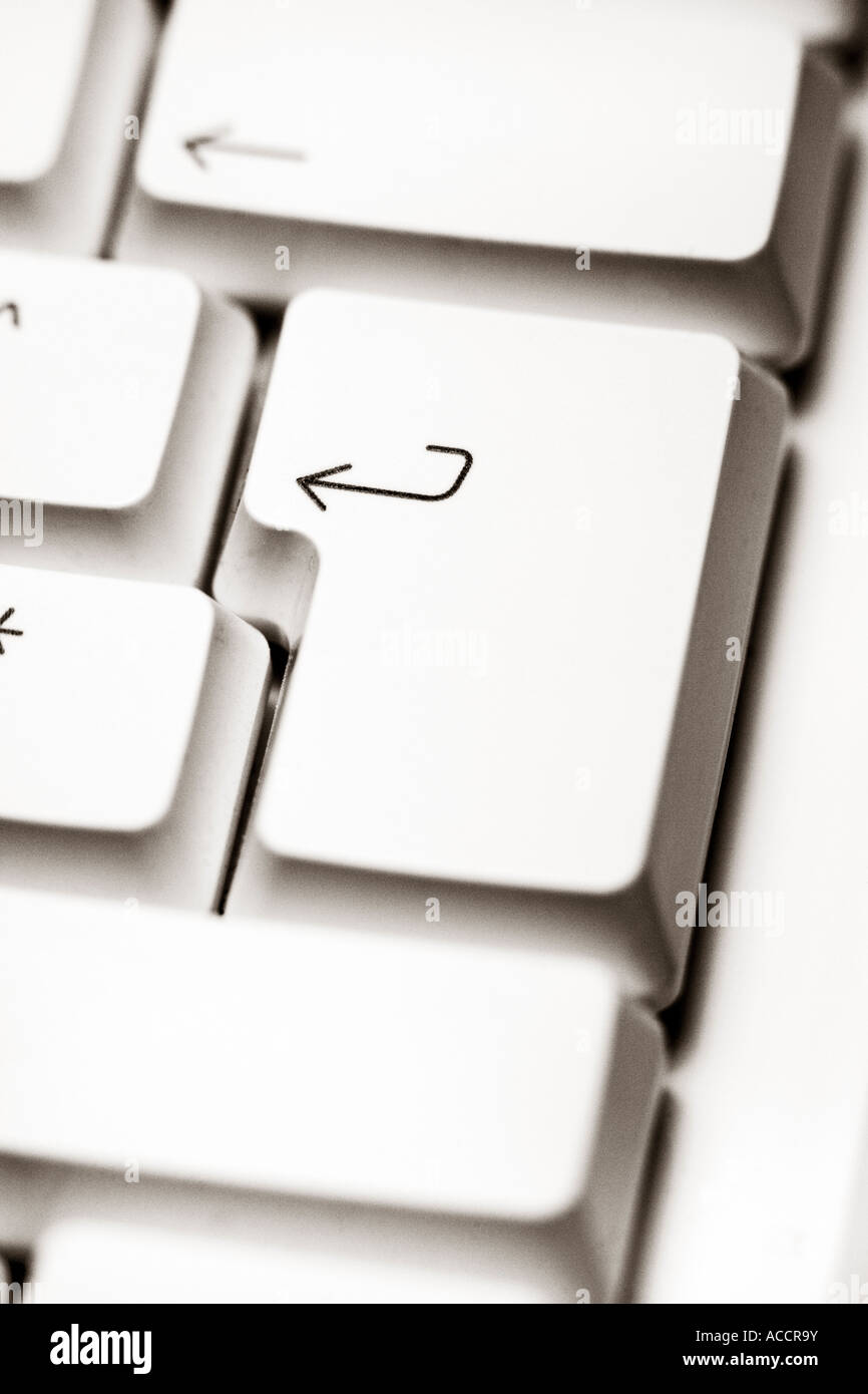 Enter-key on a keyboard Stock Photo - Alamy