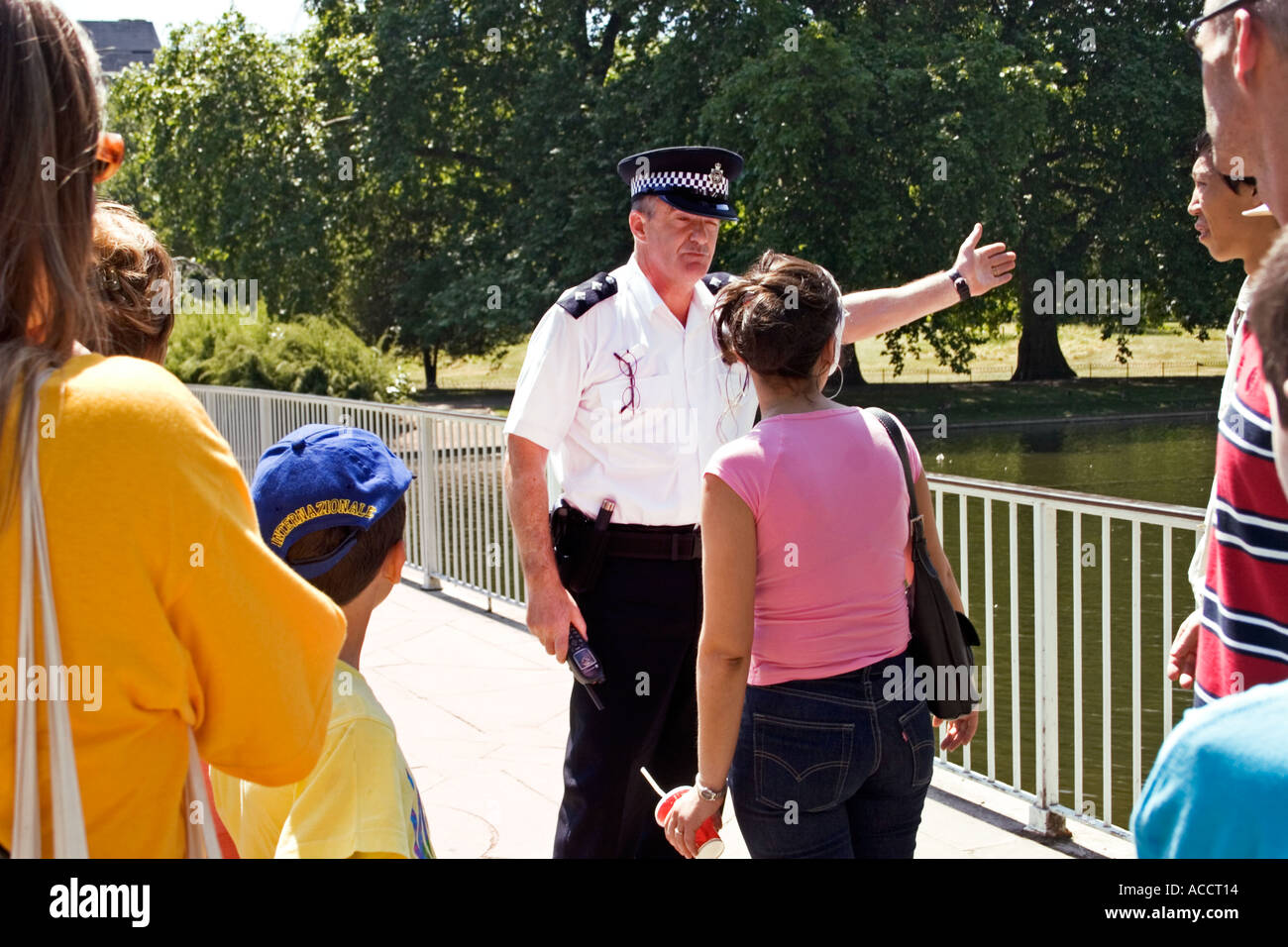 Police officer showing directions hi-res stock photography and images ...