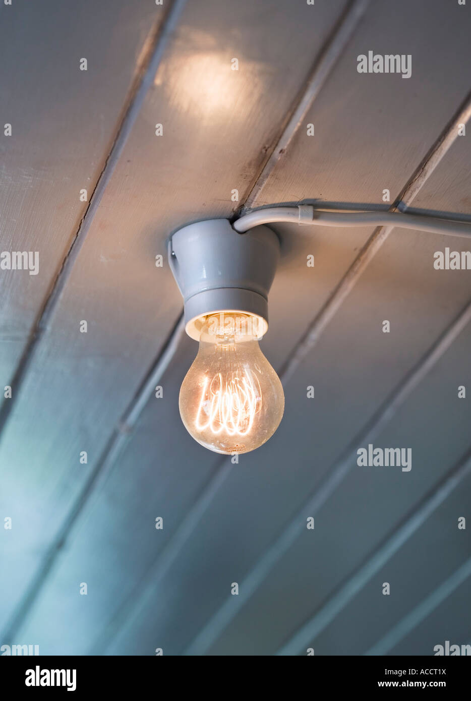 A lit light bulb Stock Photo - Alamy