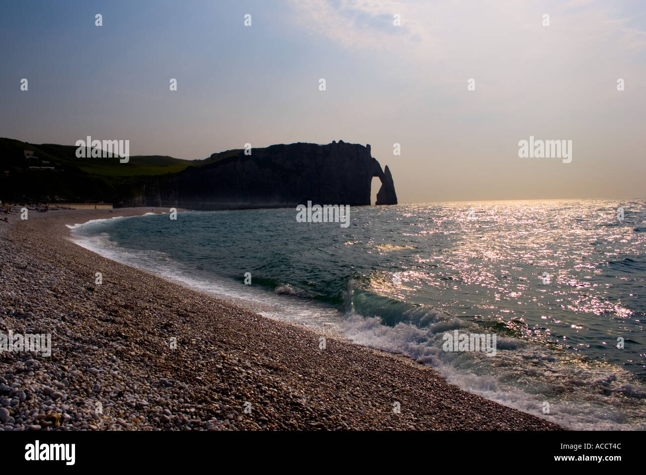 Silhouette of the needle hole cliff at the beach in Etretat France at ...