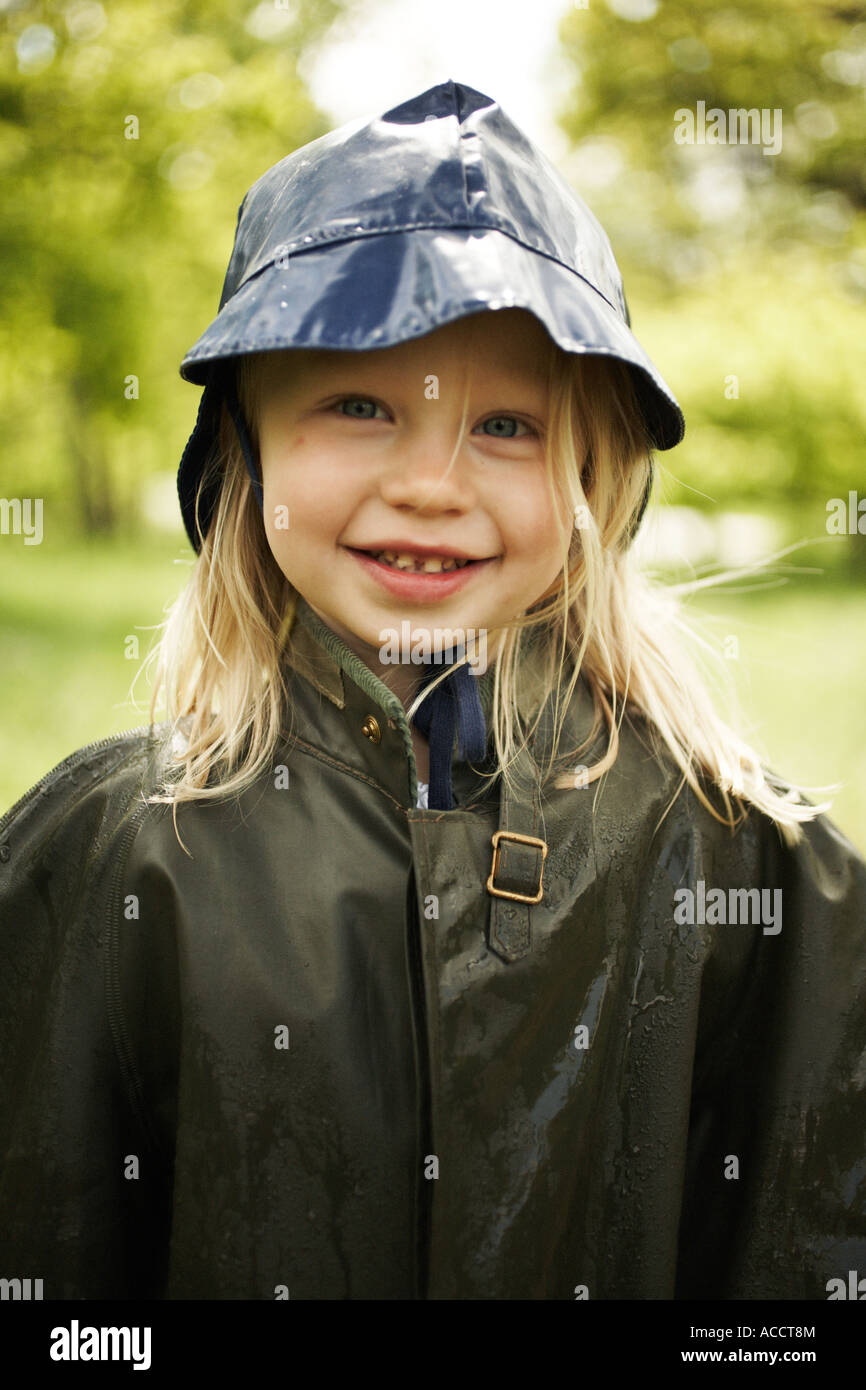 Girl wearing rain clothes Stock Photo - Alamy