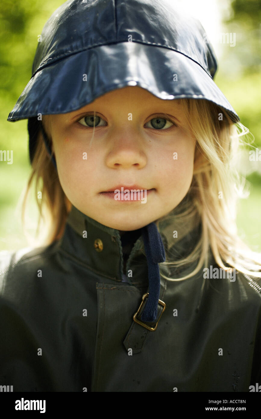 Girl wearing rain clothes Stock Photo - Alamy