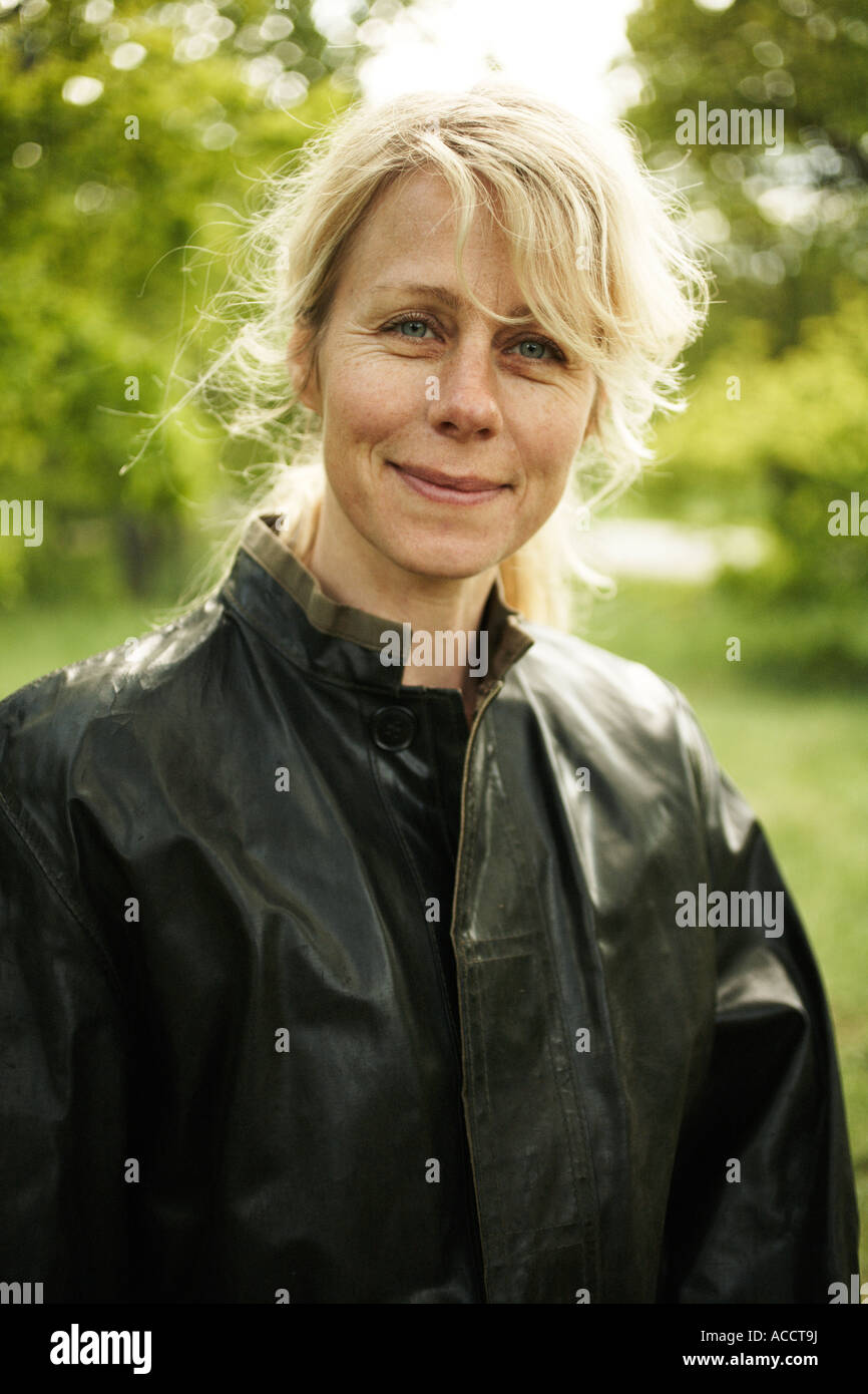 Woman wearing a rain jacket Stock Photo - Alamy