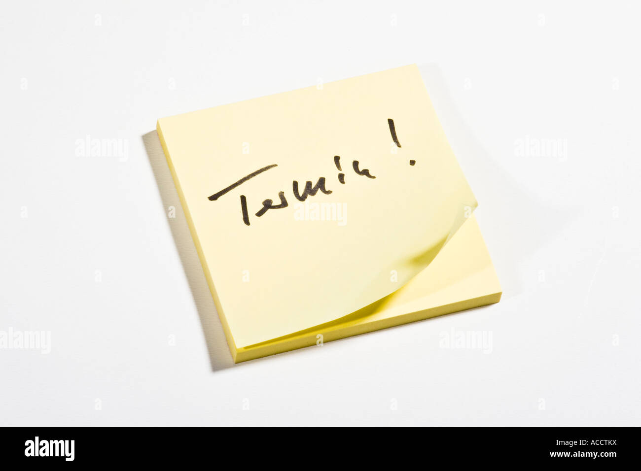 yellow sticky note with text Stock Photo - Alamy