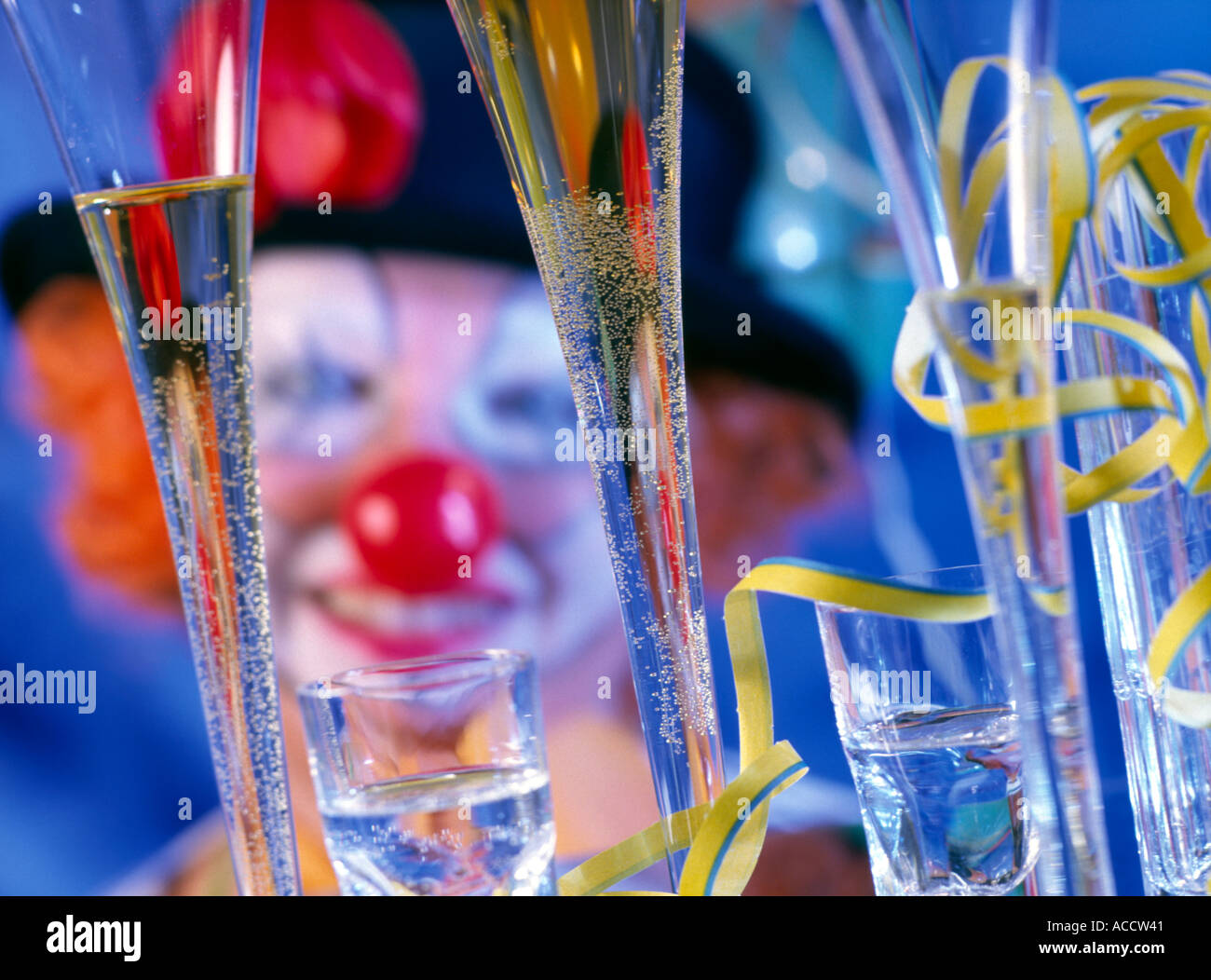 MR laughing clown behind champagne glasses Stock Photo - Alamy