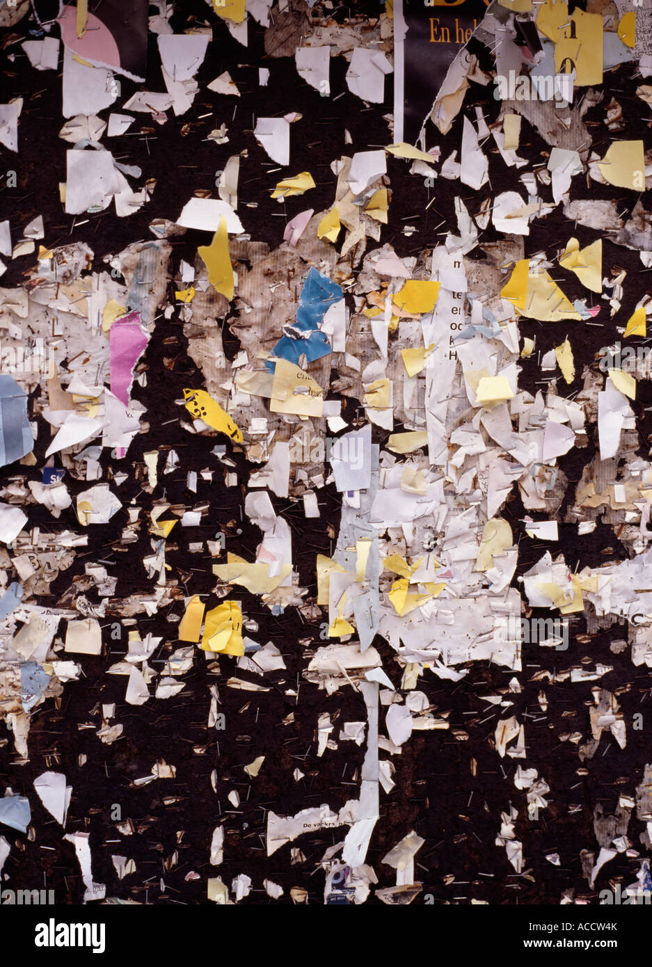 A notice board with torn notes Stock Photo - Alamy