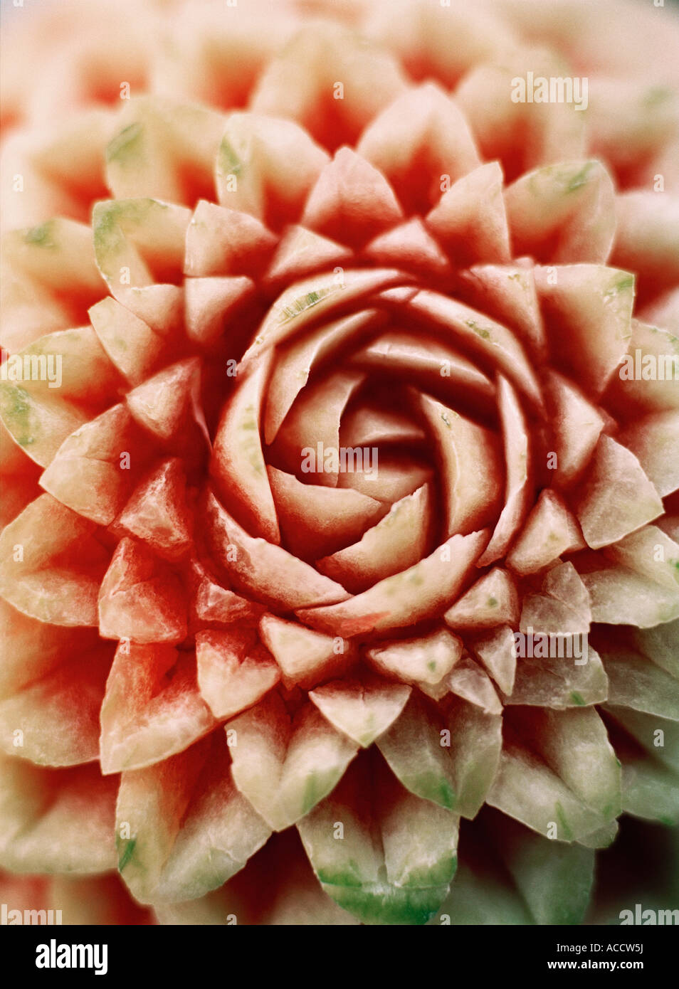 A melon cut in patterns Stock Photo - Alamy