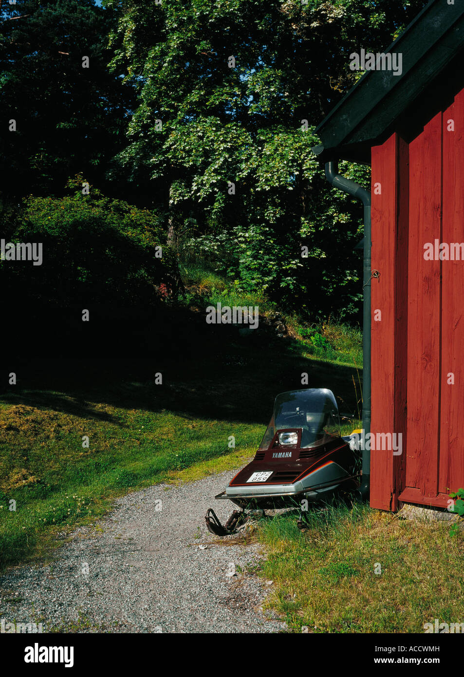 A snowcat in front of a house Stock Photo - Alamy