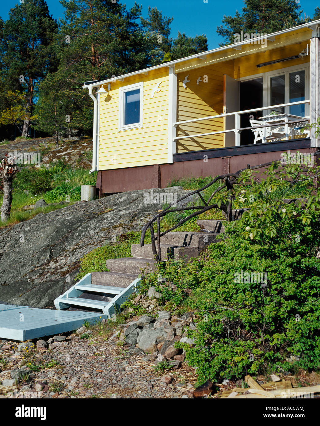 A yellow summer cottage Stock Photo - Alamy